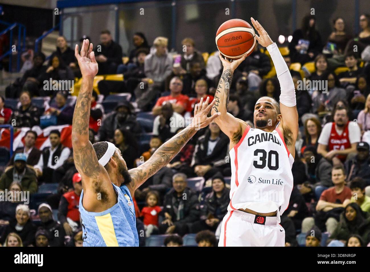 Canada‚Äôs Kassius Robertson (30) shoots from the three-point line as ...