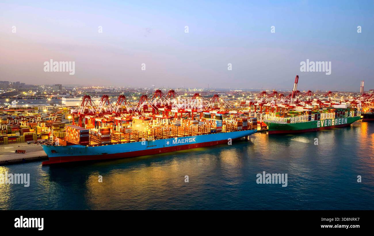 QINGDAO, CHINA - DECEMBER 1, 2025 - The cargo ship is loading and ...