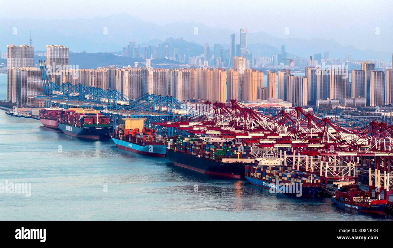QINGDAO, CHINA - DECEMBER 1, 2025 - The cargo ship is loading and ...