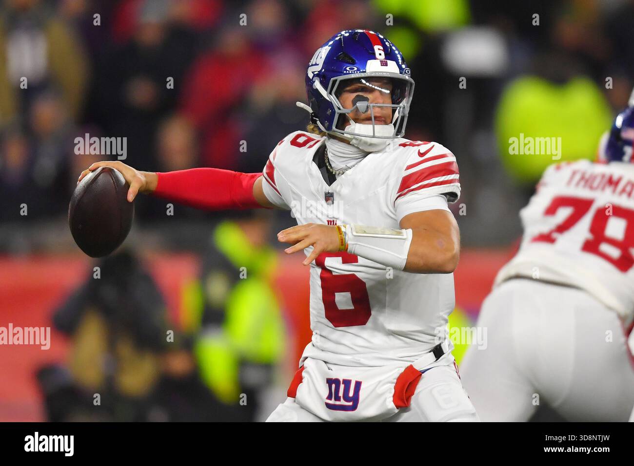 New York Giants quarterback Jaxson Dart passes against the New England ...