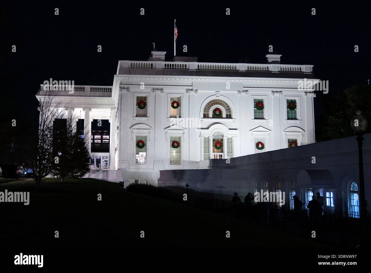 Wreaths decorate the White House, Monday, Dec. 1, 2025, in Washington ...