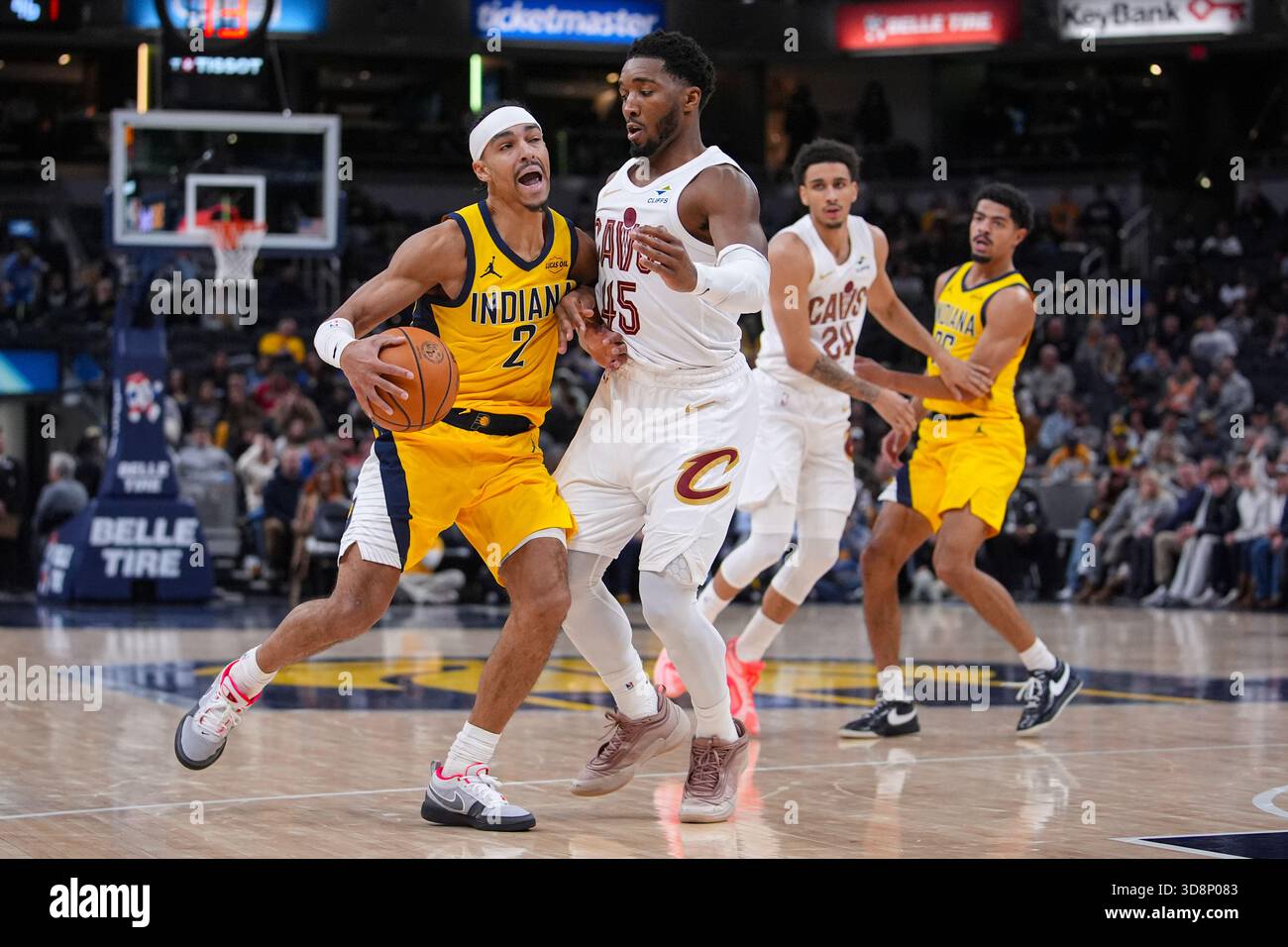 Indiana Pacers guard Andrew Nembhard (2) drives on Cleveland Cavaliers guard Donovan Mitchell ...