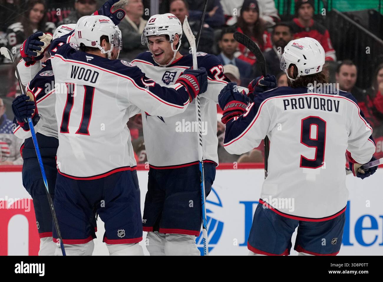 Columbus Blue Jackets' Sean Monahan, center, celebrates his goal with ...