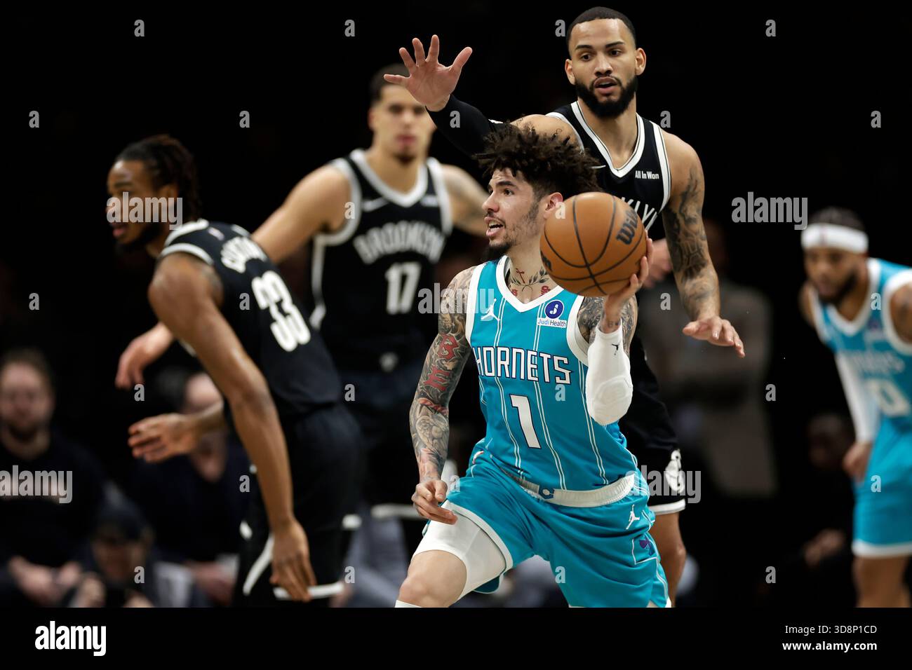 Charlotte Hornets guard LaMelo Ball (1) passes the ball during the ...