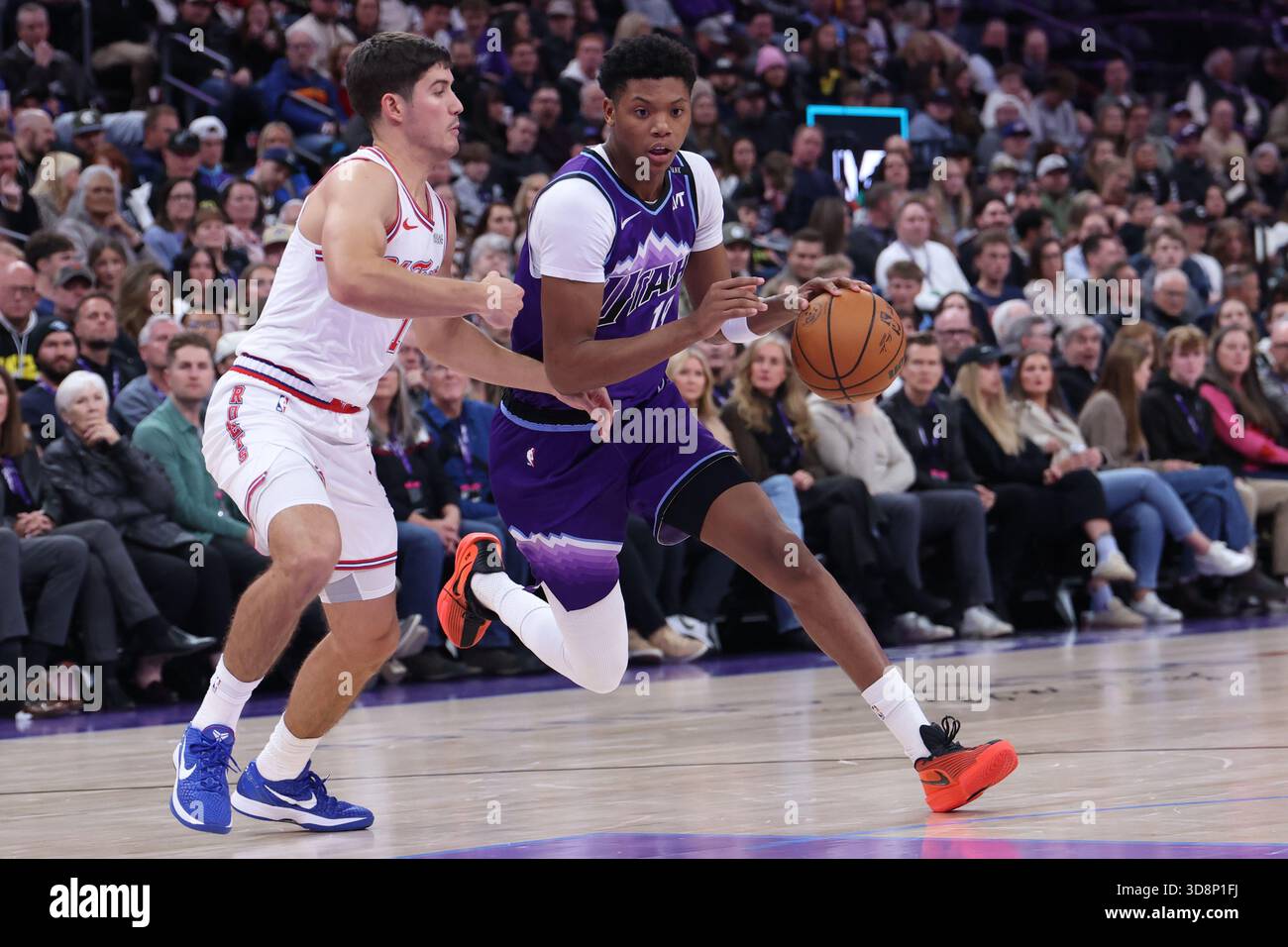 Utah Jazz guard Ace Bailey, right, drives as Houston Rockets guard Reed ...