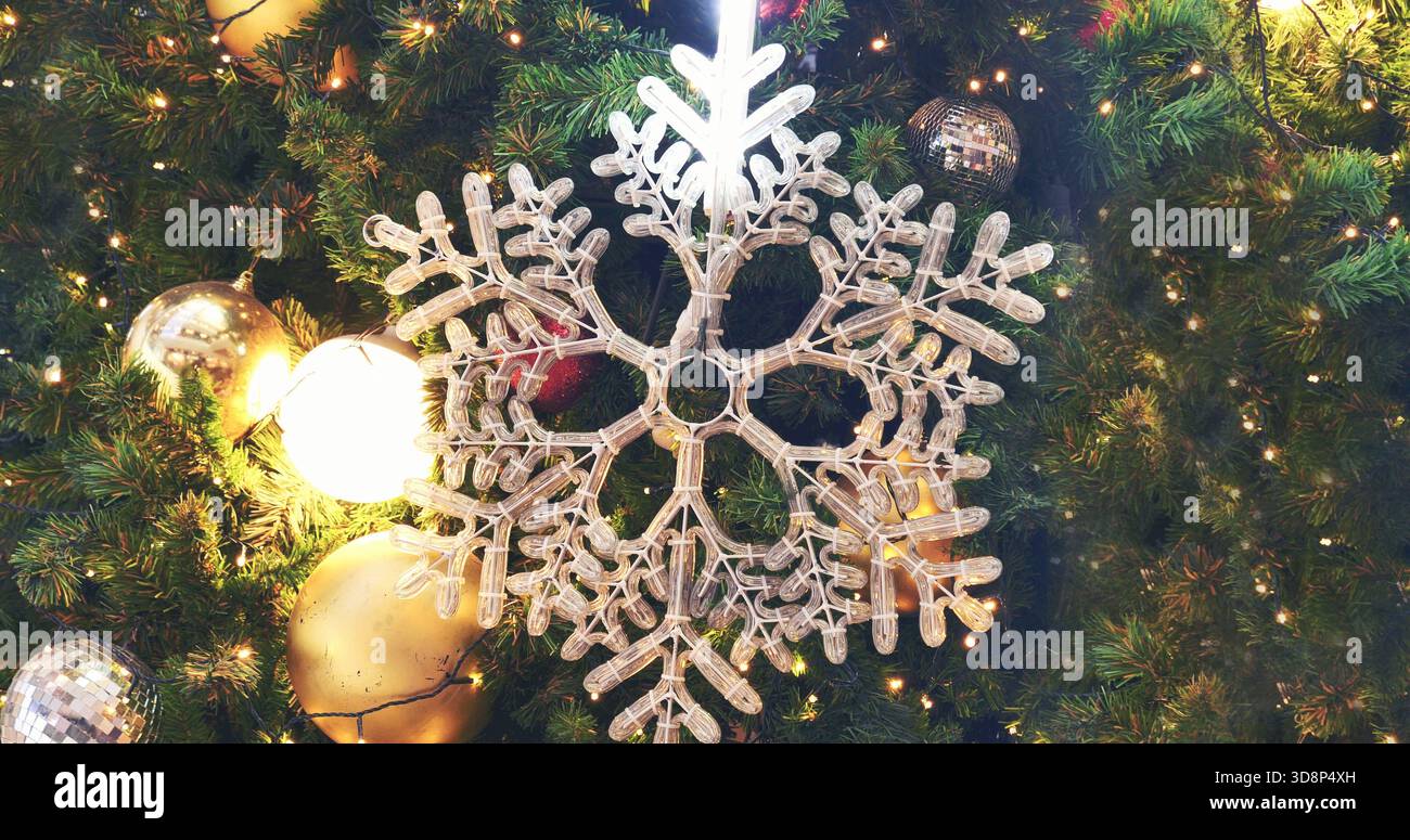 White snowflake colourful glittering baubles ornament ball decorated ...
