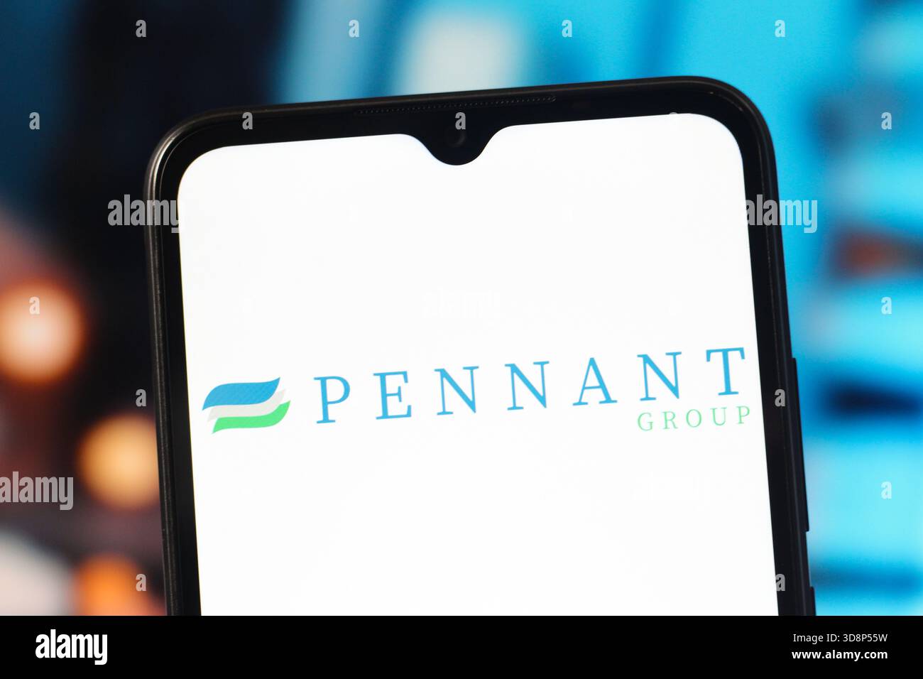 In this photo illustration, the Pennant Group logo is seen displayed on ...