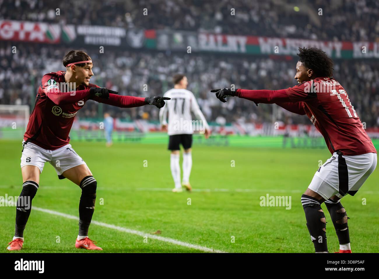 Veljko Birmancevic (L) and Angelo Preciado (R) of Sparta Praha celebrate a goal during the UEFA ...