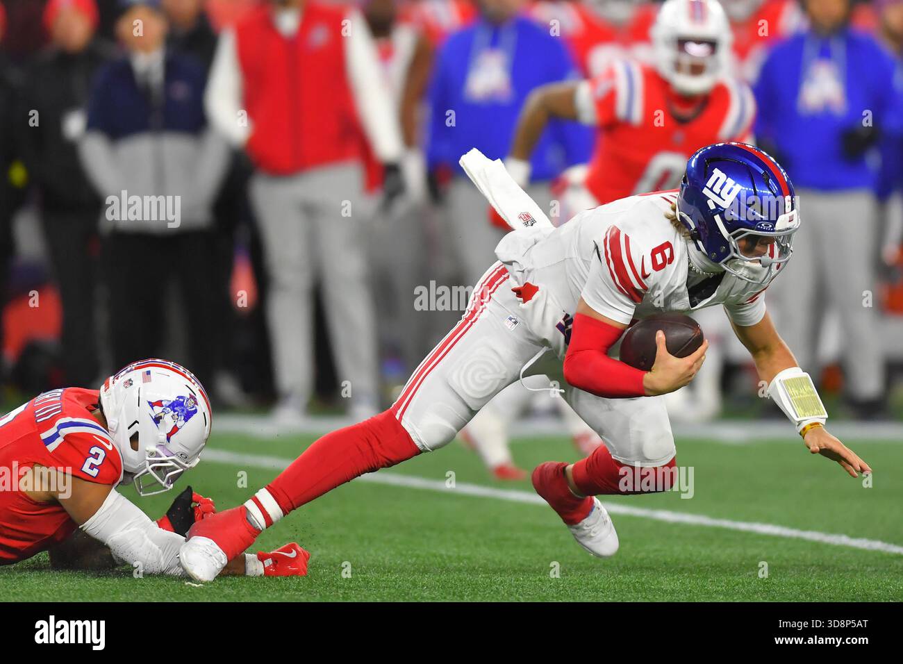 New York Giants quarterback Jaxson Dart (6) is sacked by New England ...