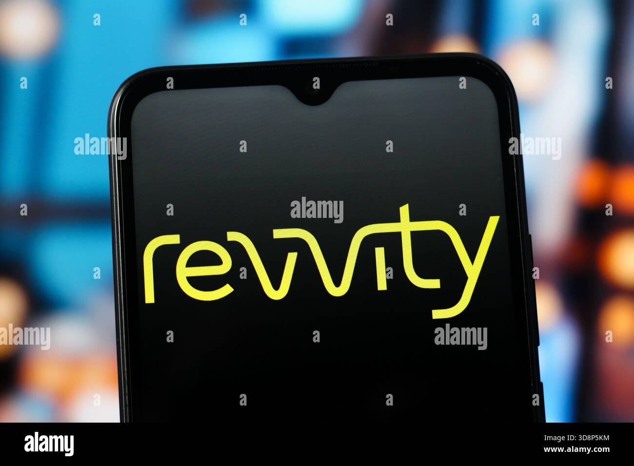 In this photo illustration, the Revvity logo is seen displayed on a ...
