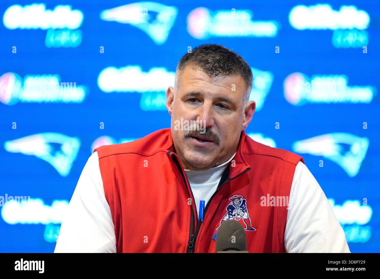 New England Patriots head coach Mike Vrabel talks to the media during a ...