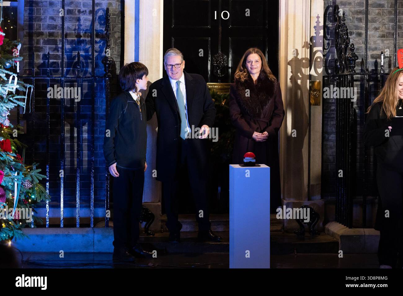 British Prime Minister Keir Starmer and wife Victoria Starmer look on ...