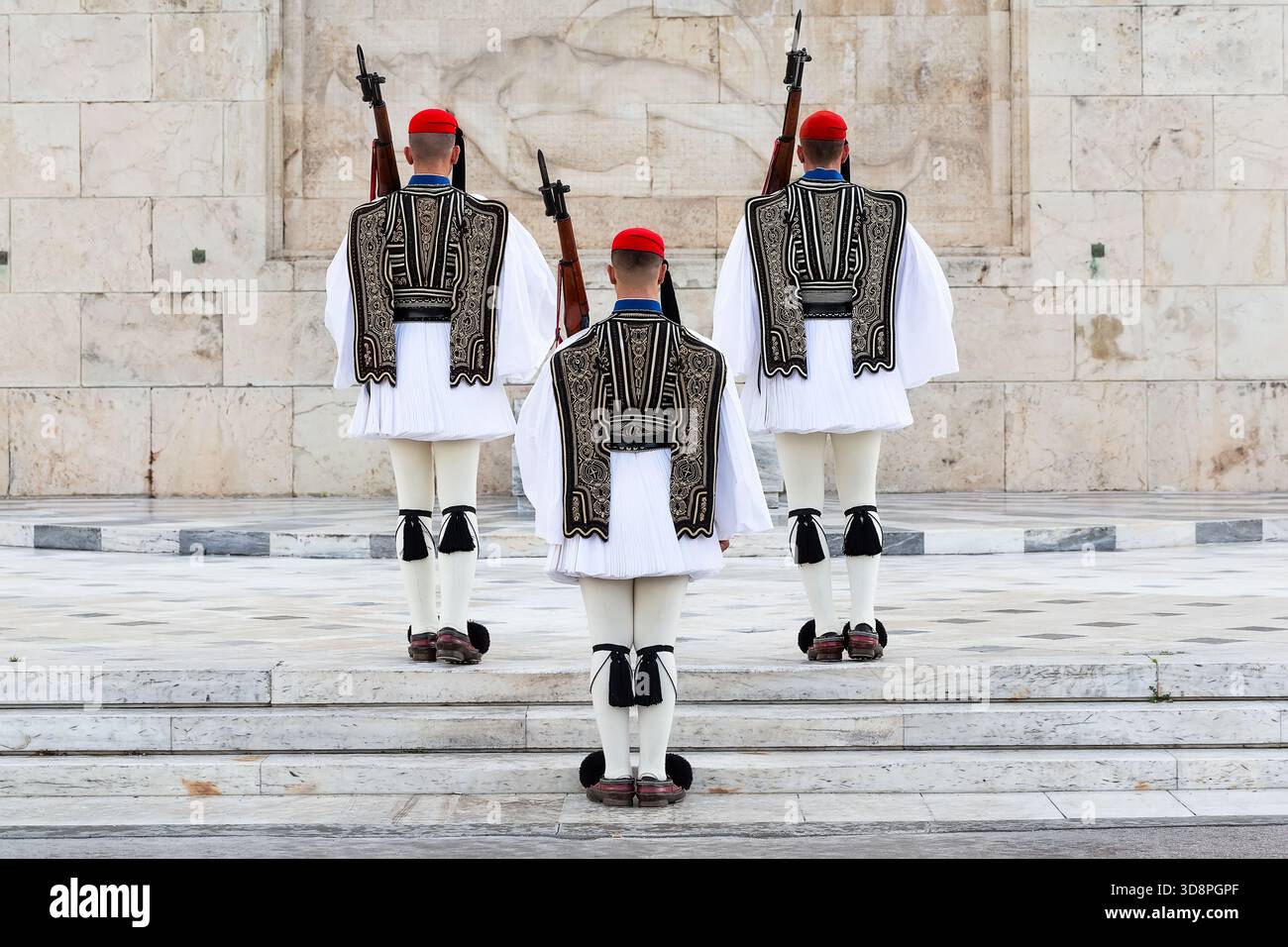 Three members of the Presidential Guard soldiers (evzones) in the city ...