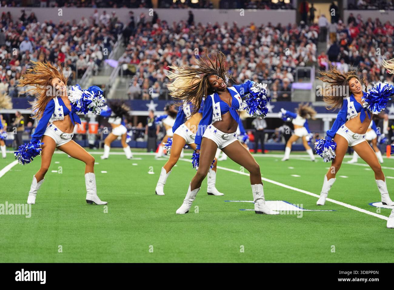 The Dallas Cowboys Cheerleaders perform during an NFL football game ...
