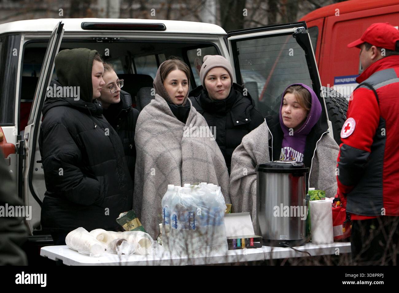 Non Exclusive: A Ukrainian Red Cross Society volunteer offers hot ...