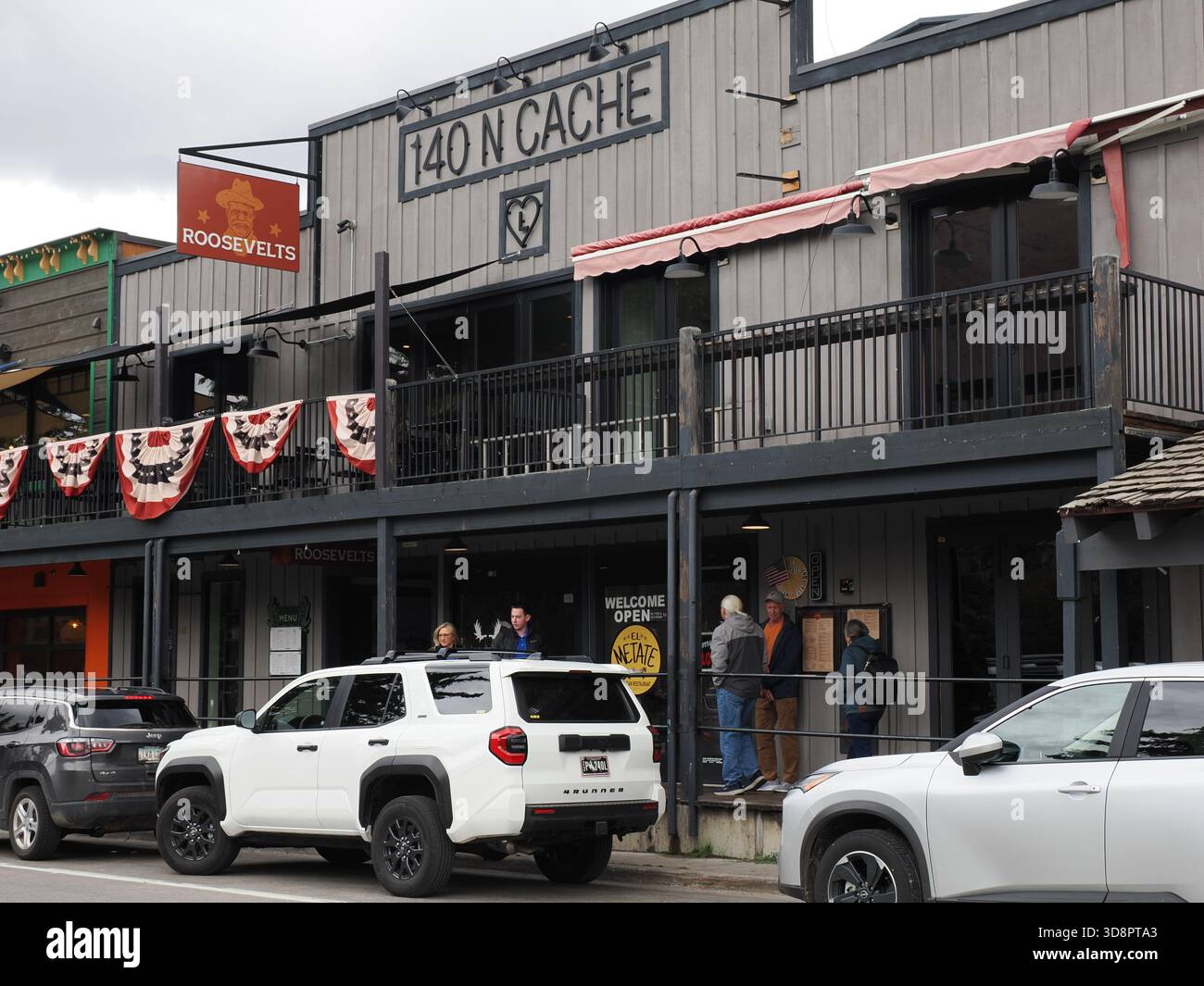 Restaurant and retail storefronts on 140 North Cache street in downtown ...