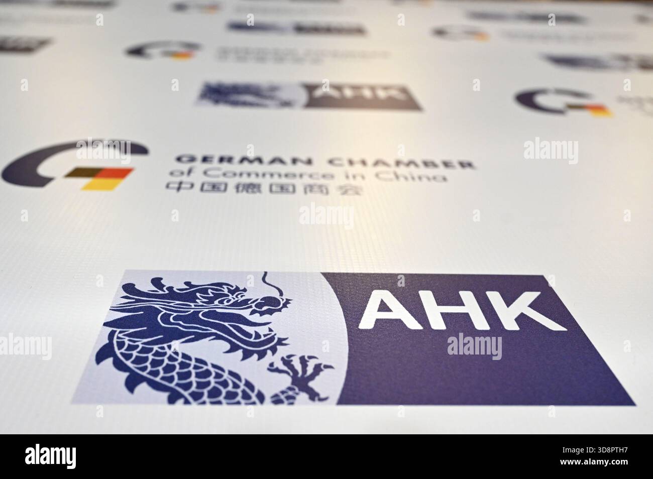 02 December 2025, China, Peking: The logo of the German Chambers of ...