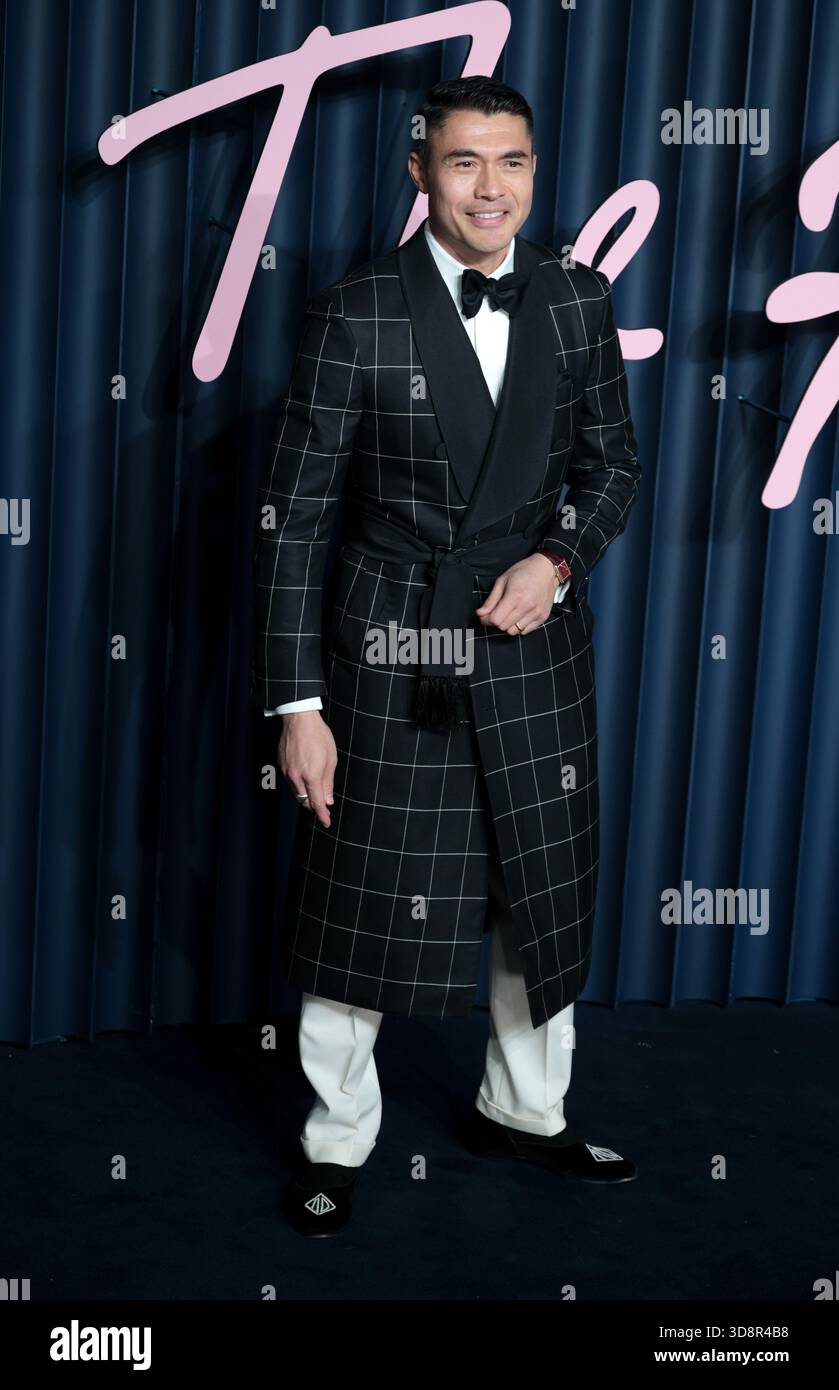 Henry Golding attends The Fashion Awards 2025 at the Royal Albert Hall ...