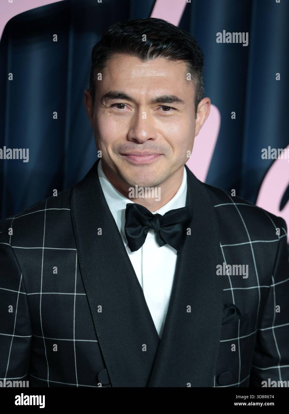 Henry Golding attends The Fashion Awards 2025 at the Royal Albert Hall ...