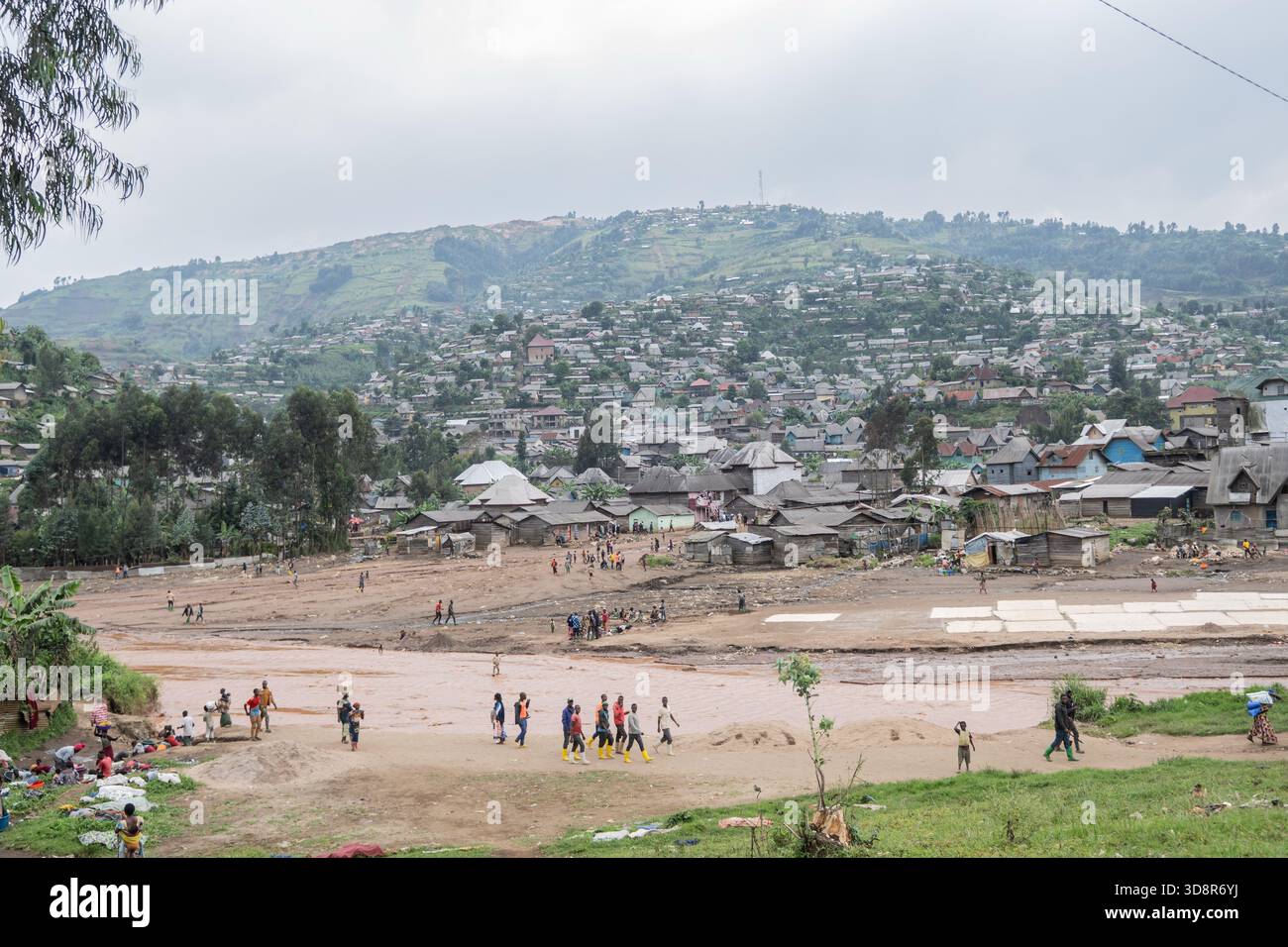 People walk in the mining town of Rubaya, eastern Democratic Republic ...
