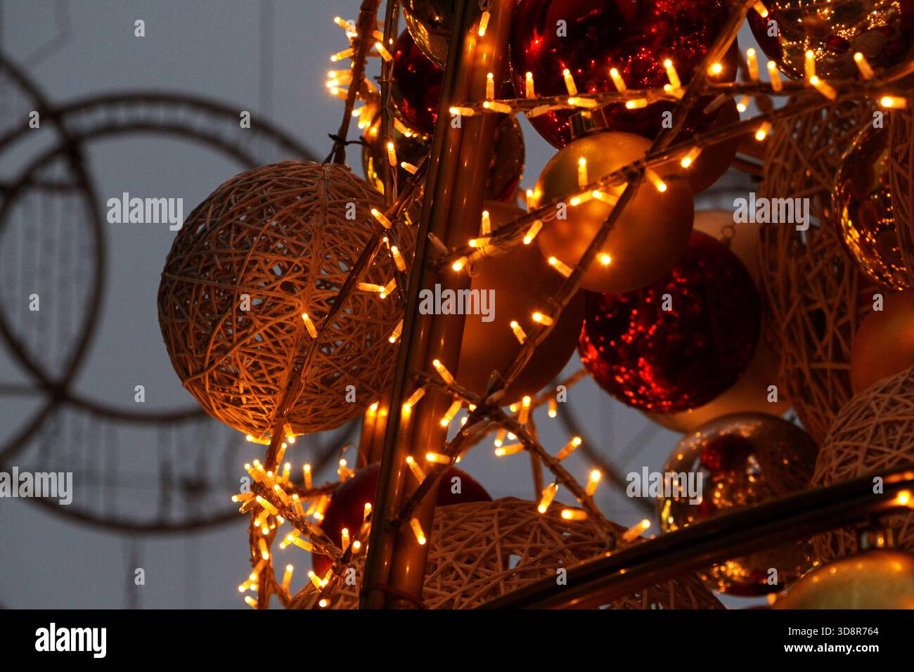 Baubles and string lights decorate a Christmas tree on Kelnskyi ...