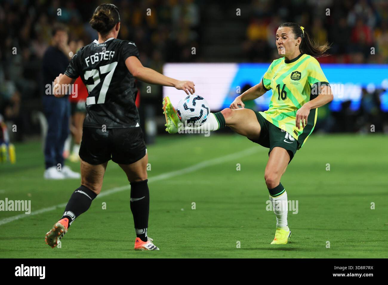 New Zealand's Michaela Foster, left, and Australia's Hayley Raso ...