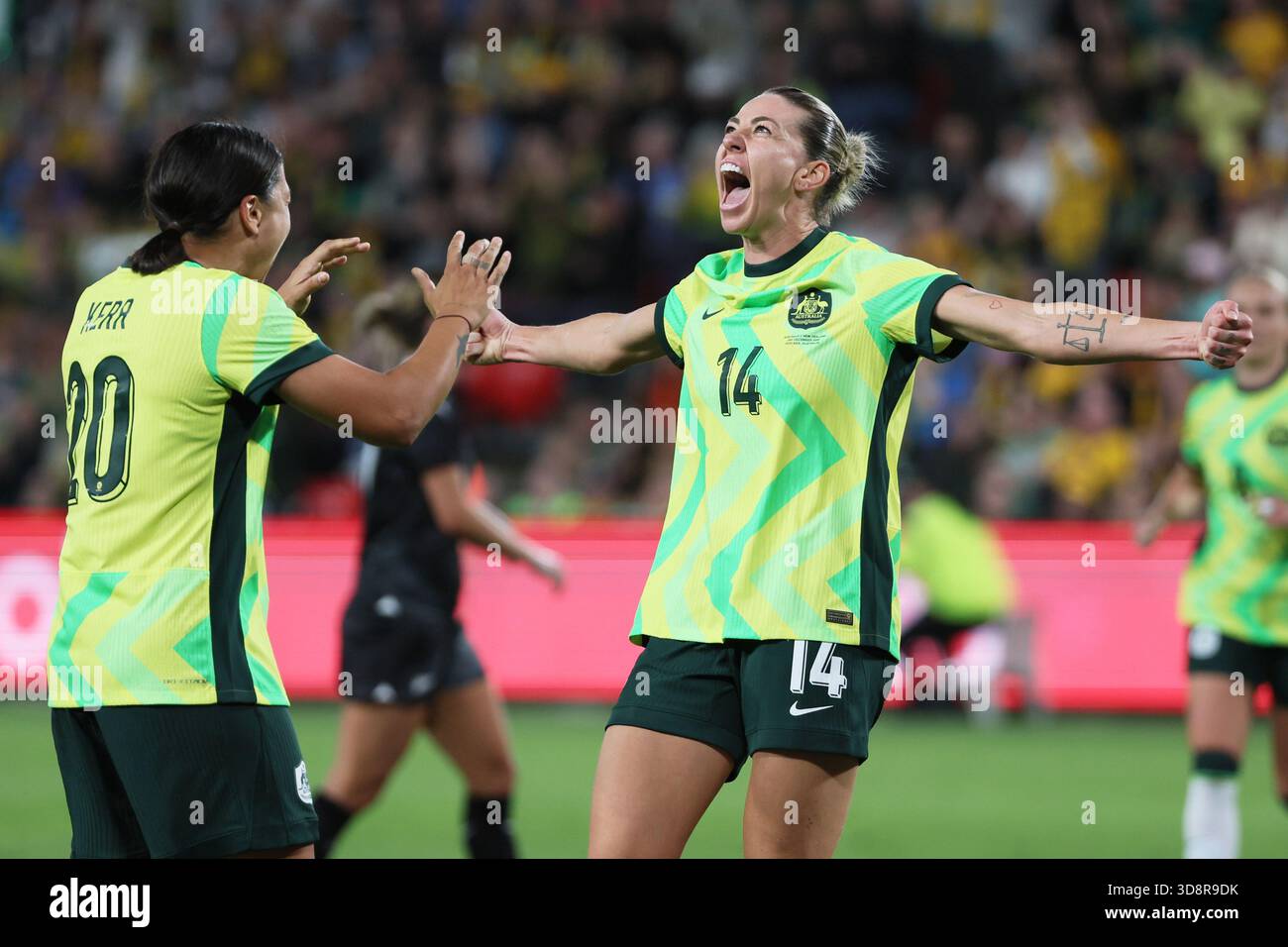 Australia's Alanna Kennedy, right, celebrates with teammate Sam Kerr ...