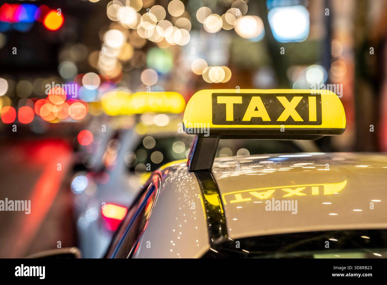 Taxi rank on Tauentzienstraße in Berlin, evening, Germany Stock Photo ...