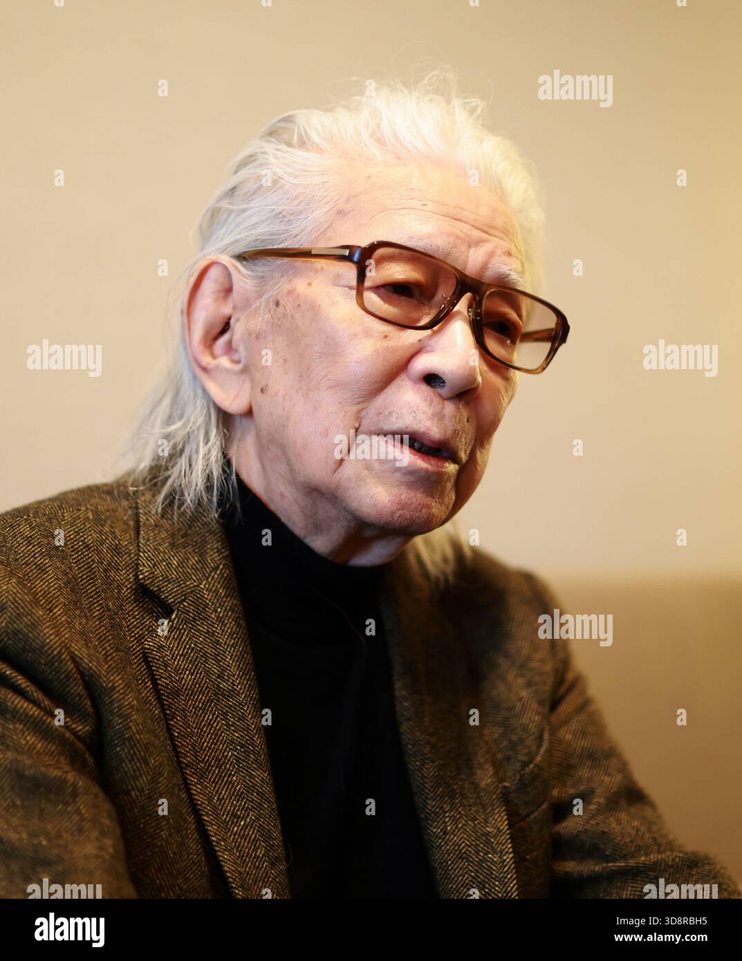 Japanese author Hiroyuki Itsuki speaks during an interview in Minato ...