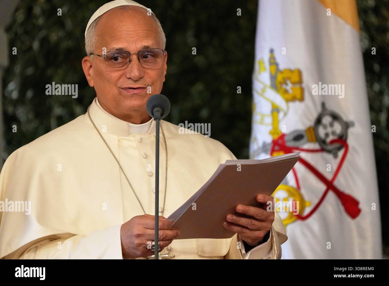 Pope Leo XIV reads a speech during a farewell ceremony at the Beirut ...