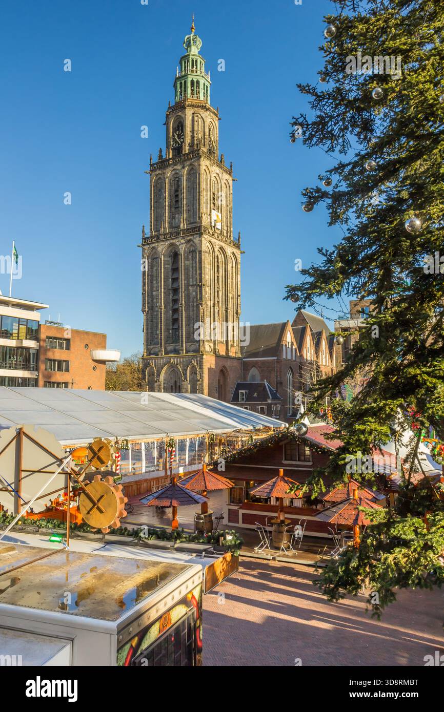 Christmas market on the square in front of the Martini church tower in ...