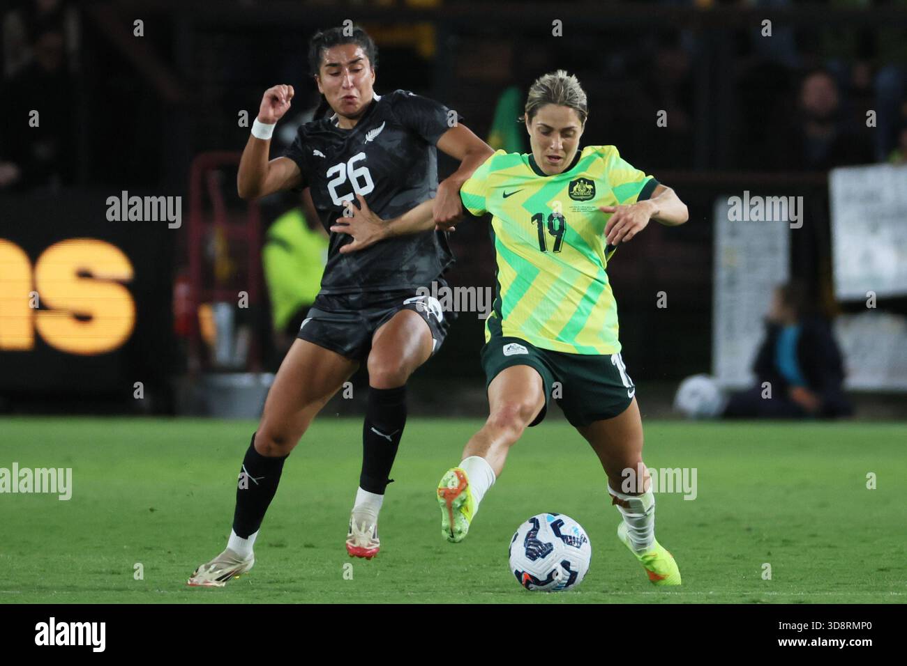 New Zealand's Maya Hahn, left, and Australia's Katrina Gorry battle for ...