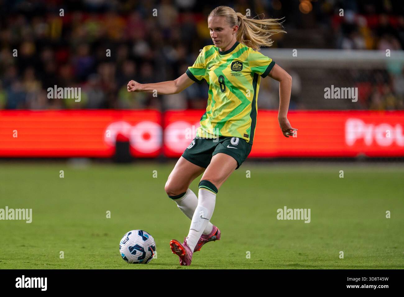 Kaitlyn Torpey (8 Australia) passes the ball during the international ...