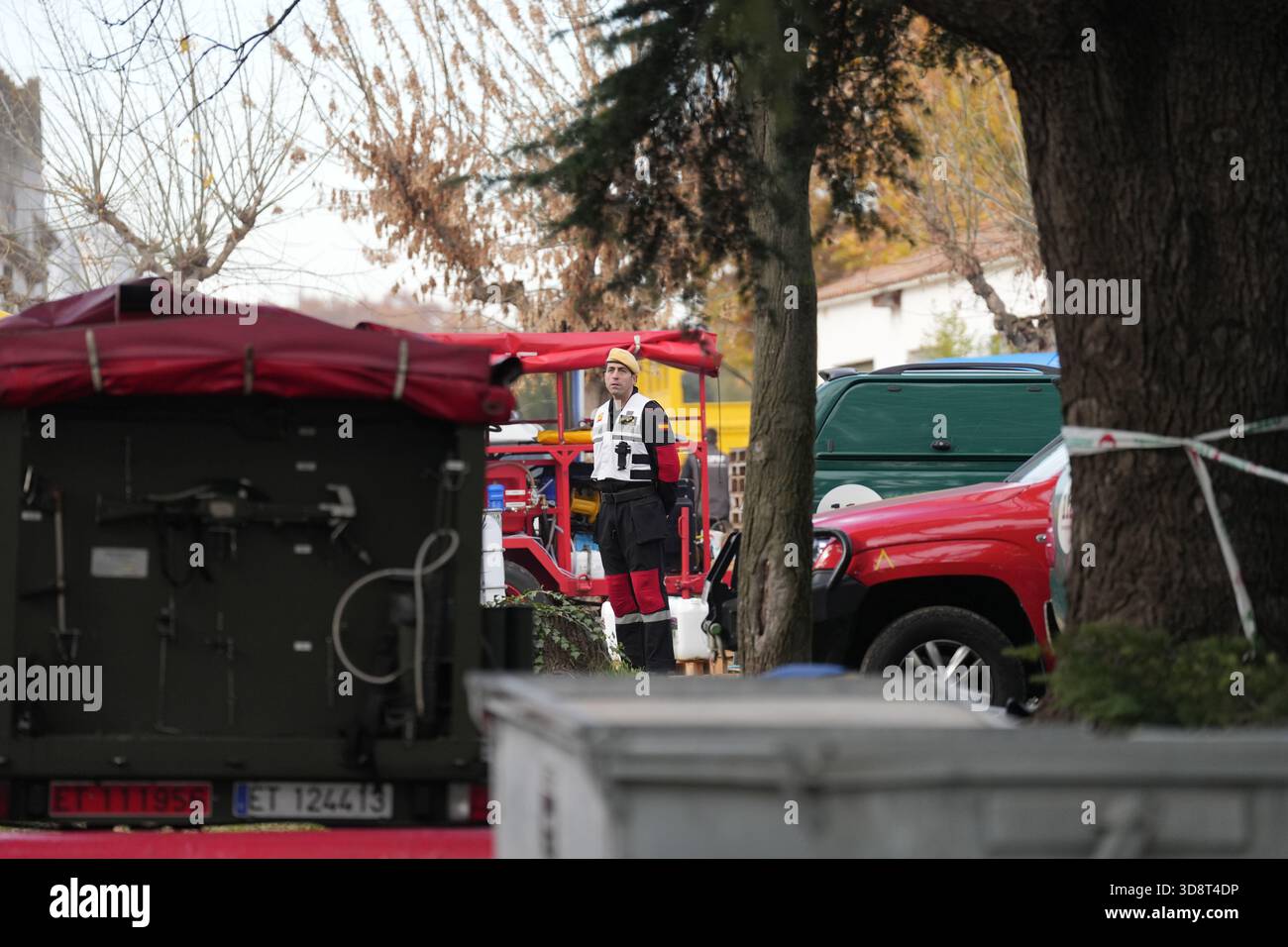 Several EMU personnel disinfect vehicles during the presentation of EMU ...