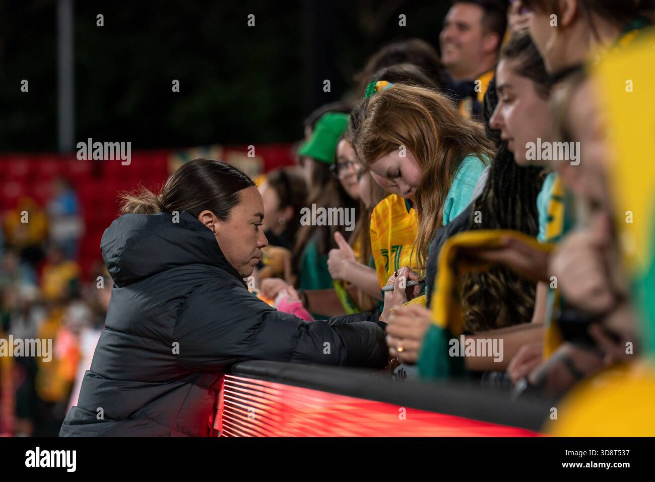 Goalkeeper Mackenzie Arnold (1 Australia) signs an autograph during the ...