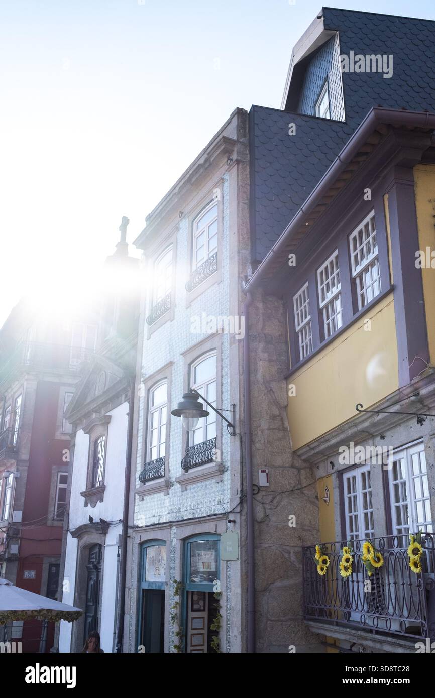 Sunny view of a traditional street in Porto, northern Portugal, on May ...