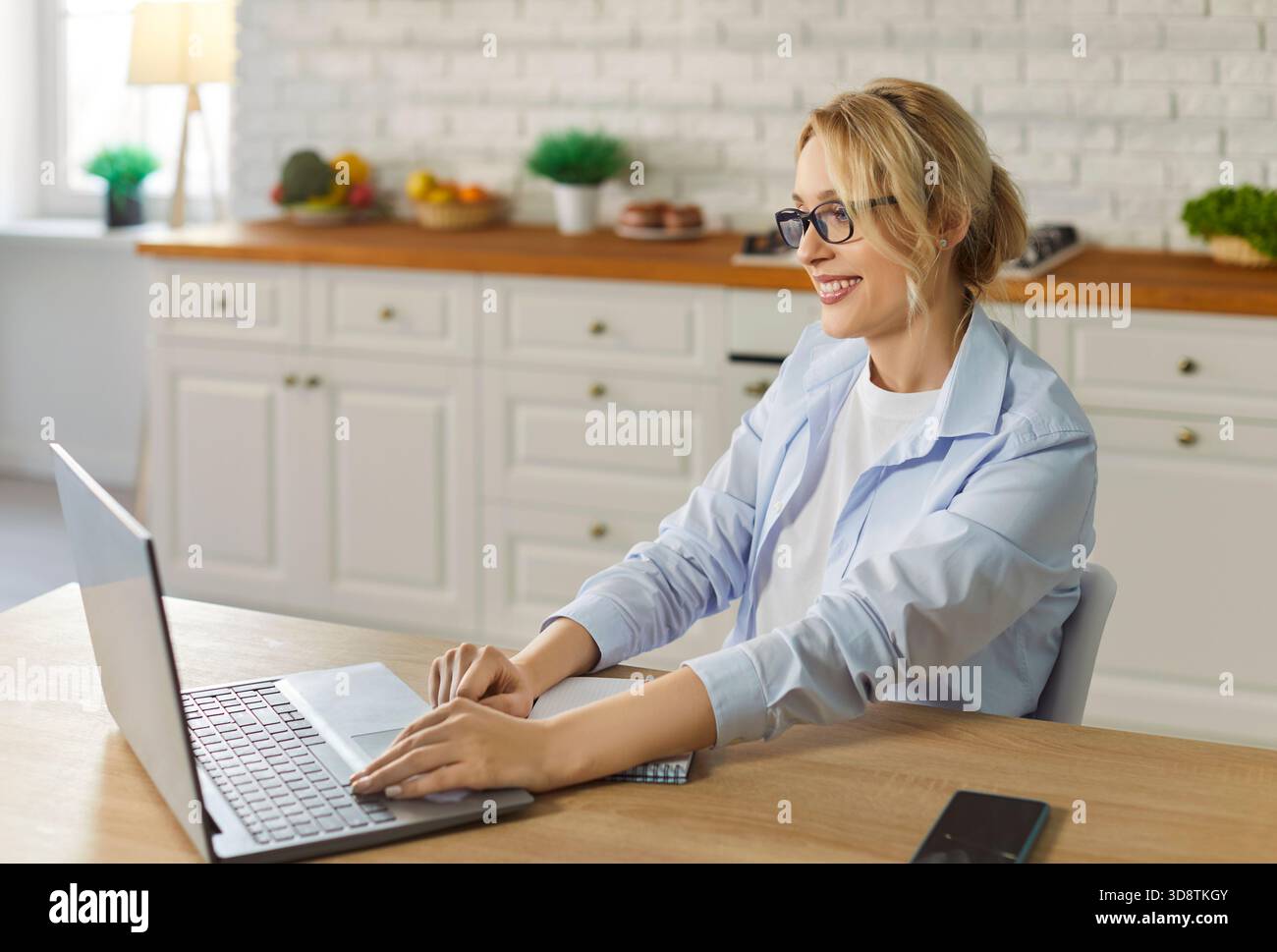 Woman working focused on laptop hi-res stock photography and images - Alamy