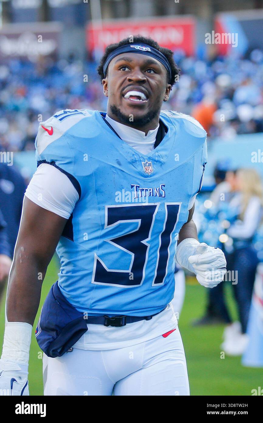 Tennessee Titans running back Kalel Mullings (31) runs to the locker ...
