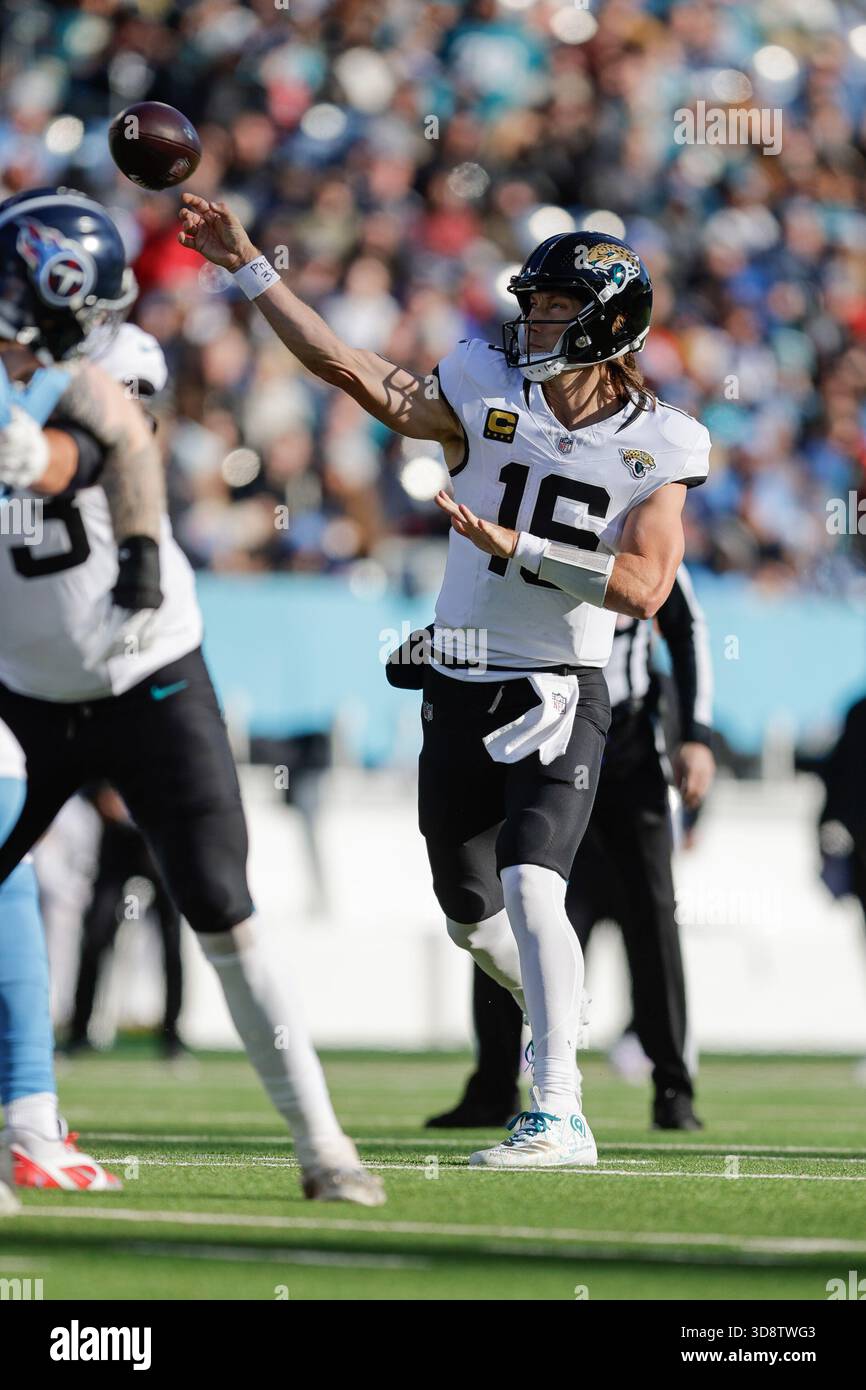 Jacksonville Jaguars quarterback Trevor Lawrence (16) passes the ball ...