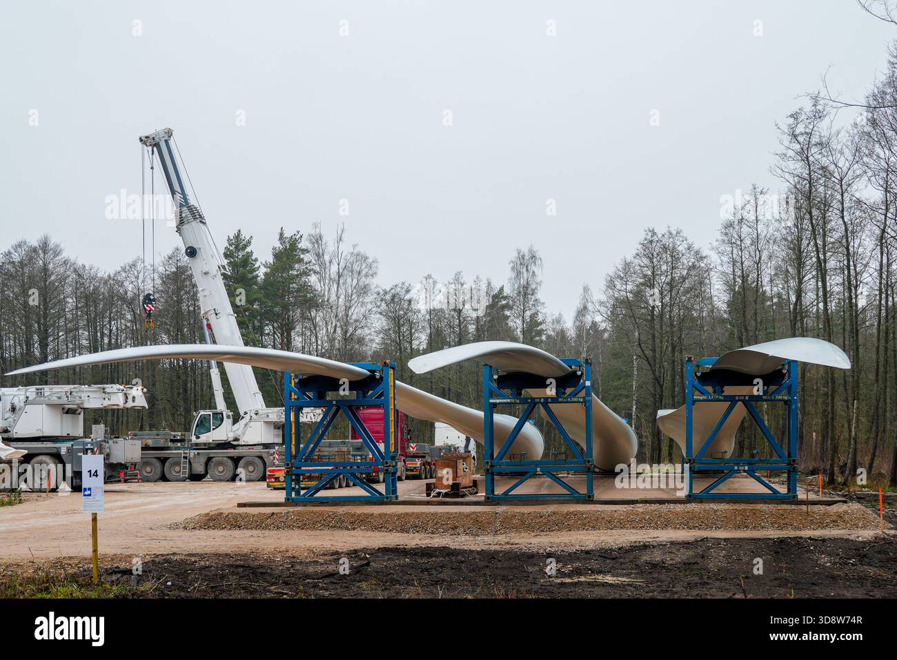 Wind turbine blades prepared for installation with crane and support ...