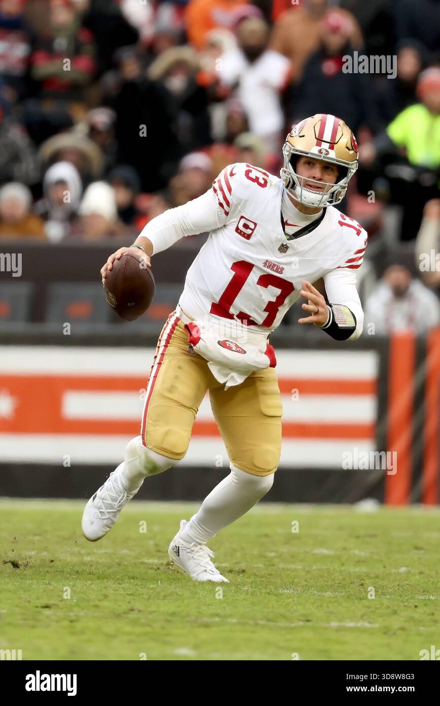 San Francisco 49ers quarterback Brock Purdy (13) runs with the ball ...