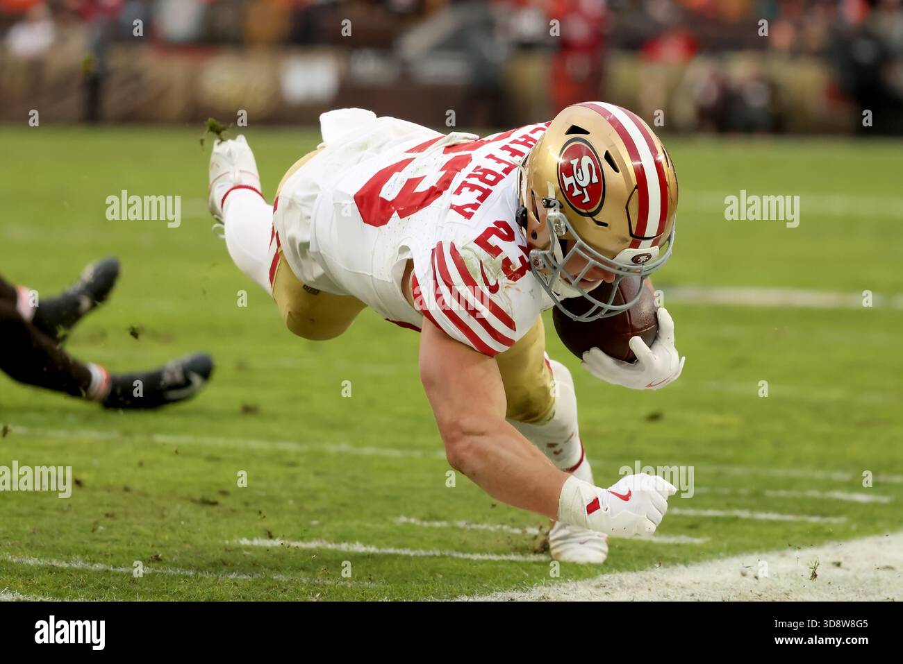 San Francisco 49ers running back Christian McCaffrey (23) runs with the ...