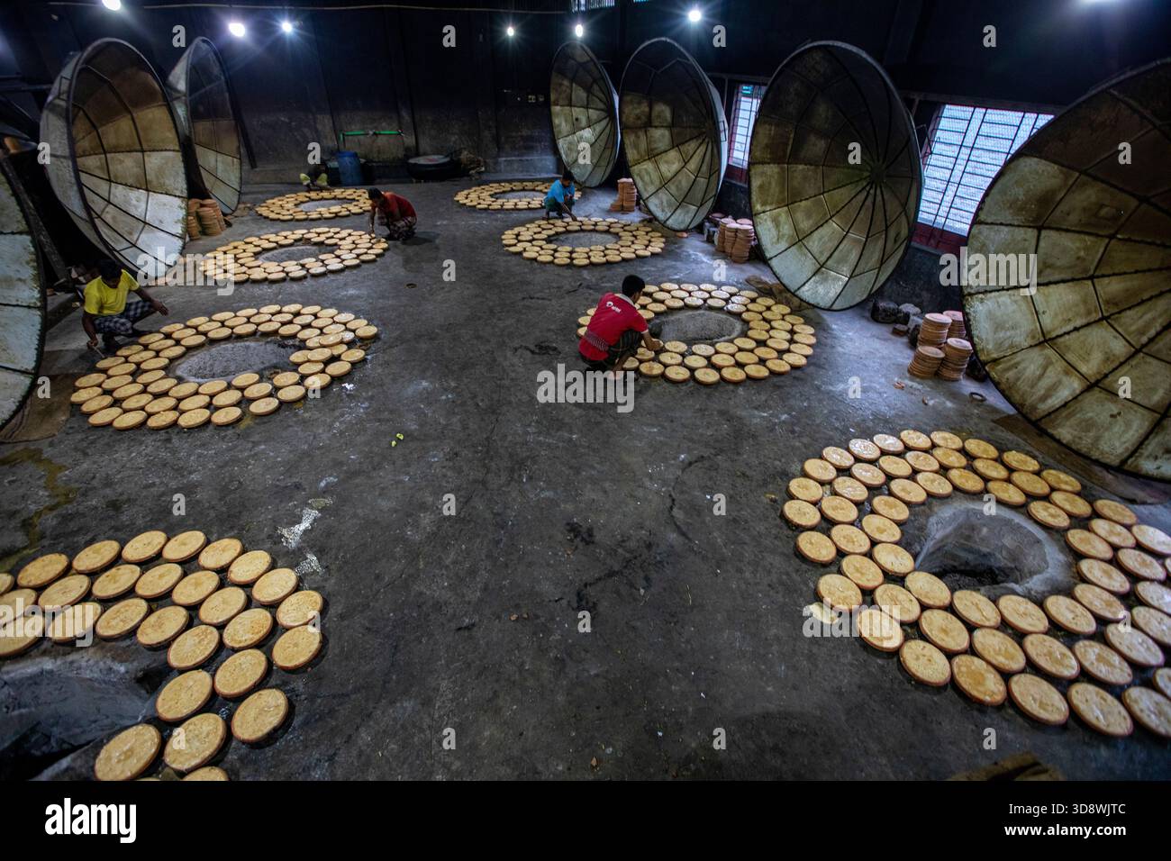 The art of yogurt making: workers producing the renowned bogra doi with ...