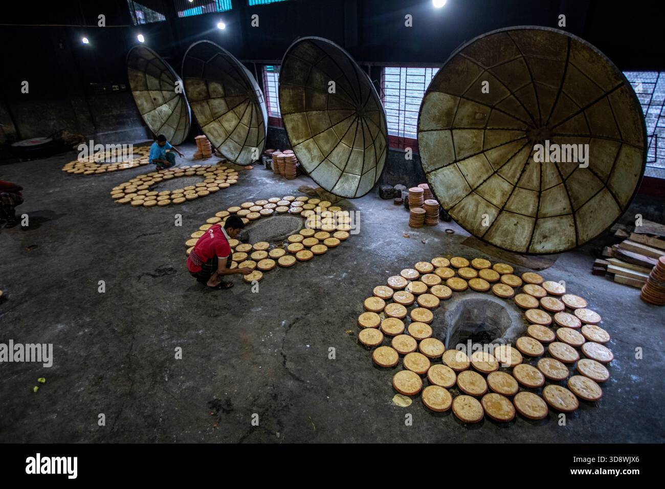 The art of yogurt making: workers producing the renowned bogra doi with ...