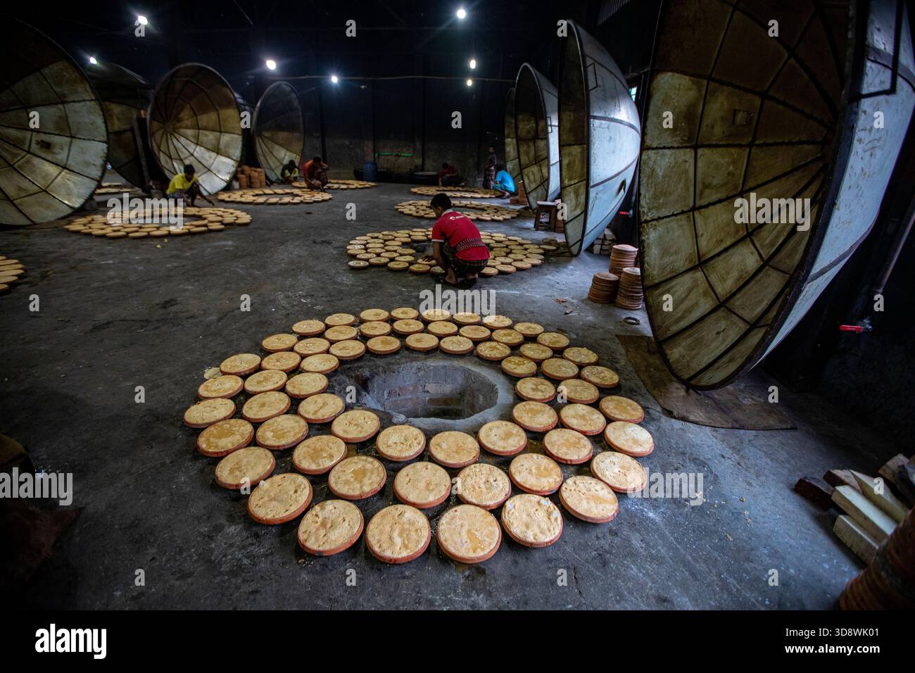 The art of yogurt making: workers producing the renowned bogra doi with ...