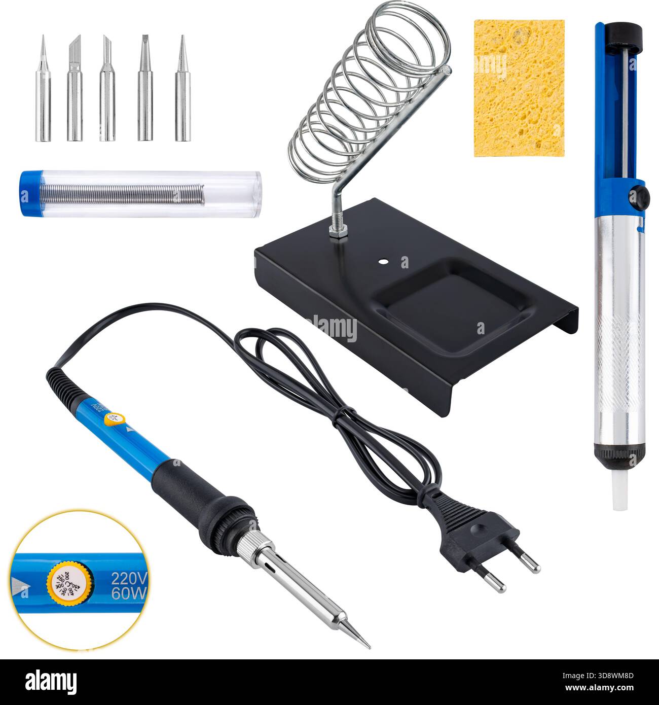 Compact soldering iron with stand, set of tips, flux and solder, on a ...