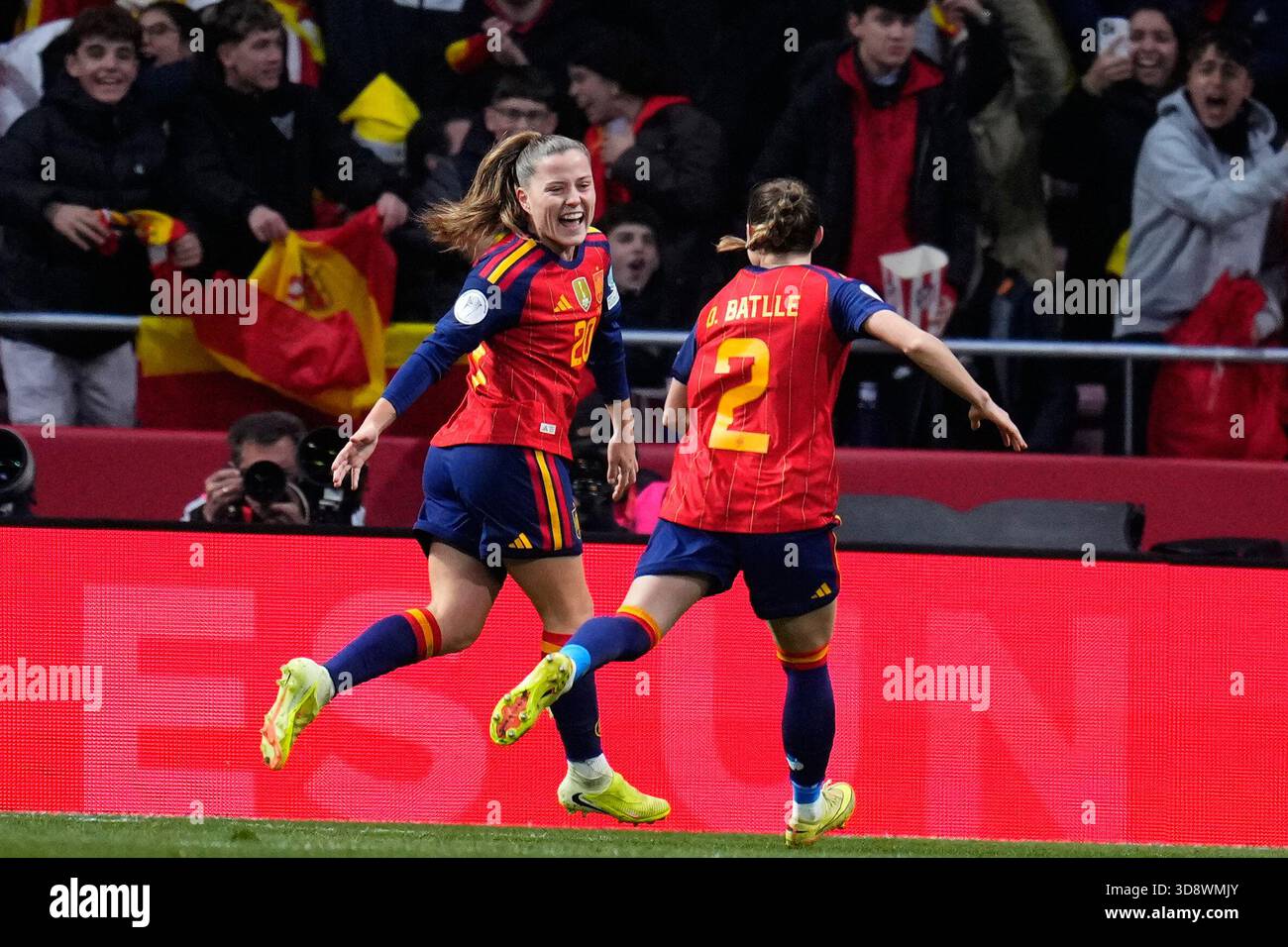Spain's Claudia Pina, left, celebrates after scoring the opening goal ...