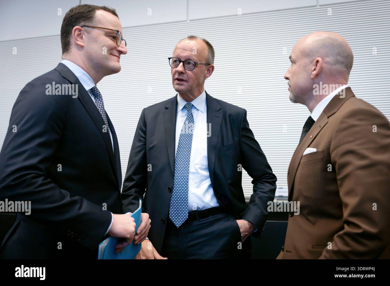Jens Spahn, Friedrich Merz, and Alexander Hoffmann at the CDU/CSU ...