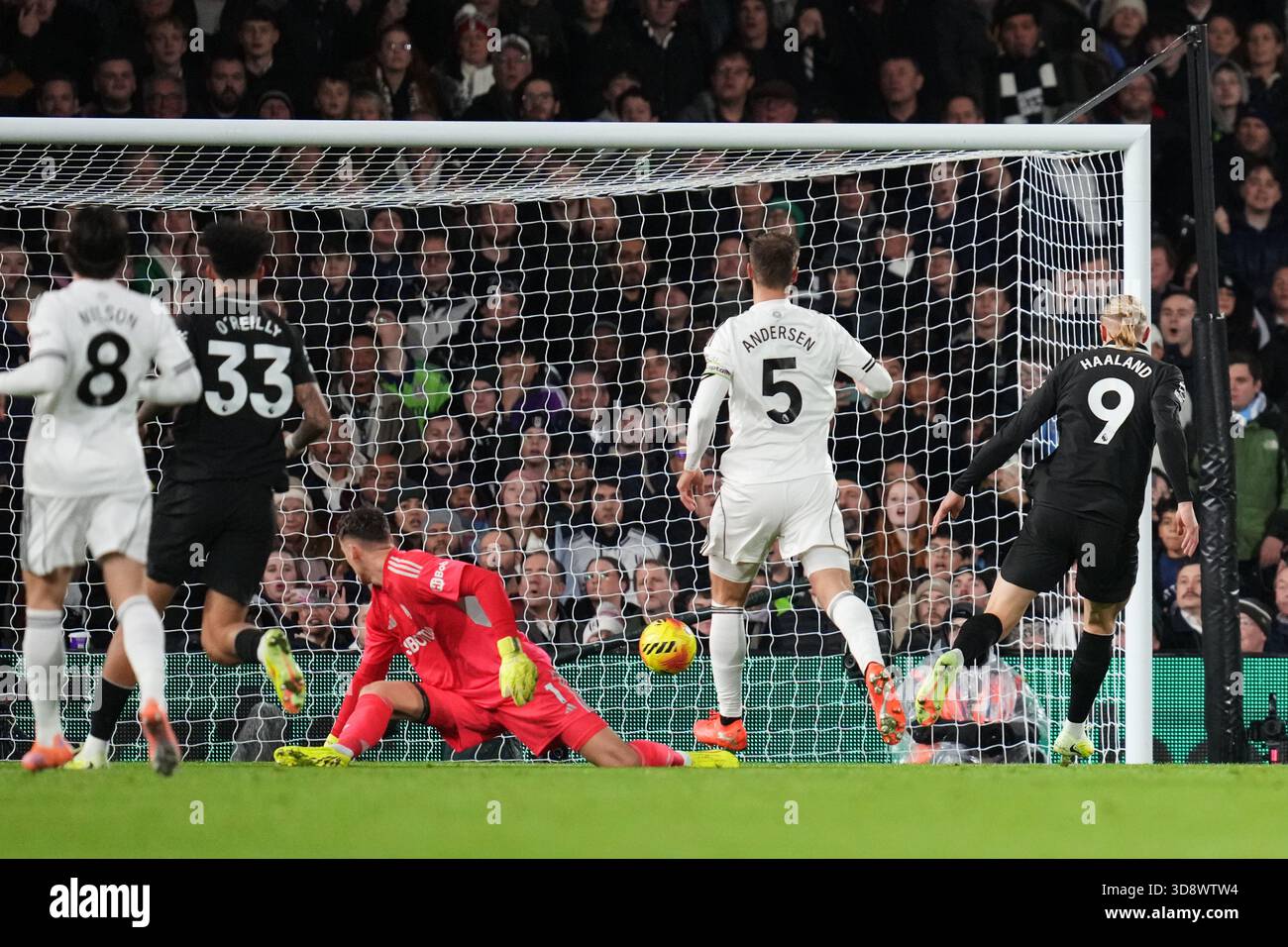 Manchester City's Erling Haaland, right, takes a shot on goal during ...