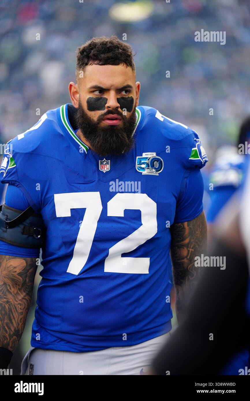 Seattle Seahawks offensive tackle Abraham Lucas (72) looks on before an ...